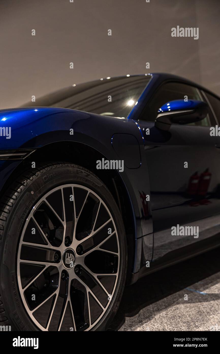 Circa 2023 - Sofia, Bulgaria: A blue shiny new Porsche Tacan car on ...