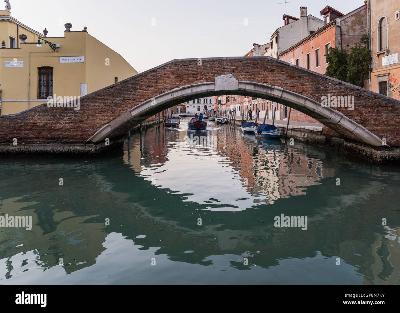 architectural detail of an old brick bridge in Venice, Italy Stock ...