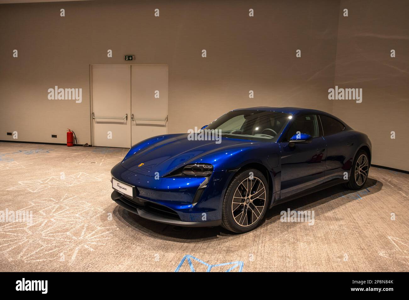 Circa 2023 - Sofia, Bulgaria: A blue shiny new Porsche Tacan car on ...