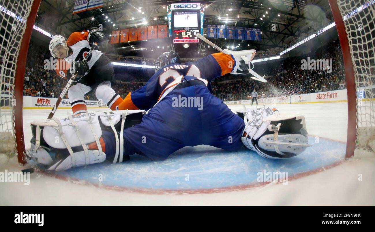 Philadelphia Flyers' Danny Briere, left, scores against New York ...