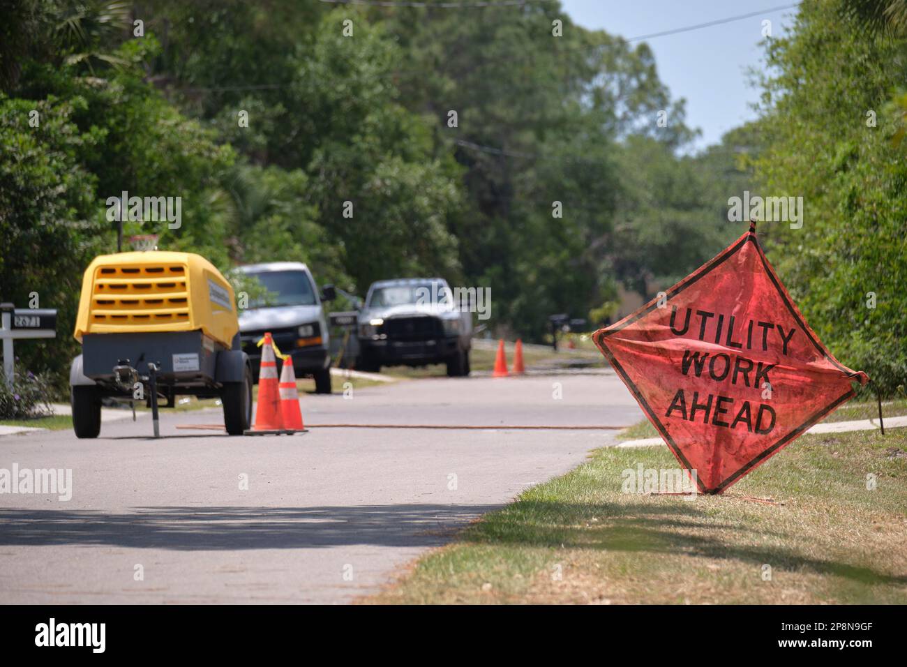 Road work ahead sign on street site as warning to cars about ...