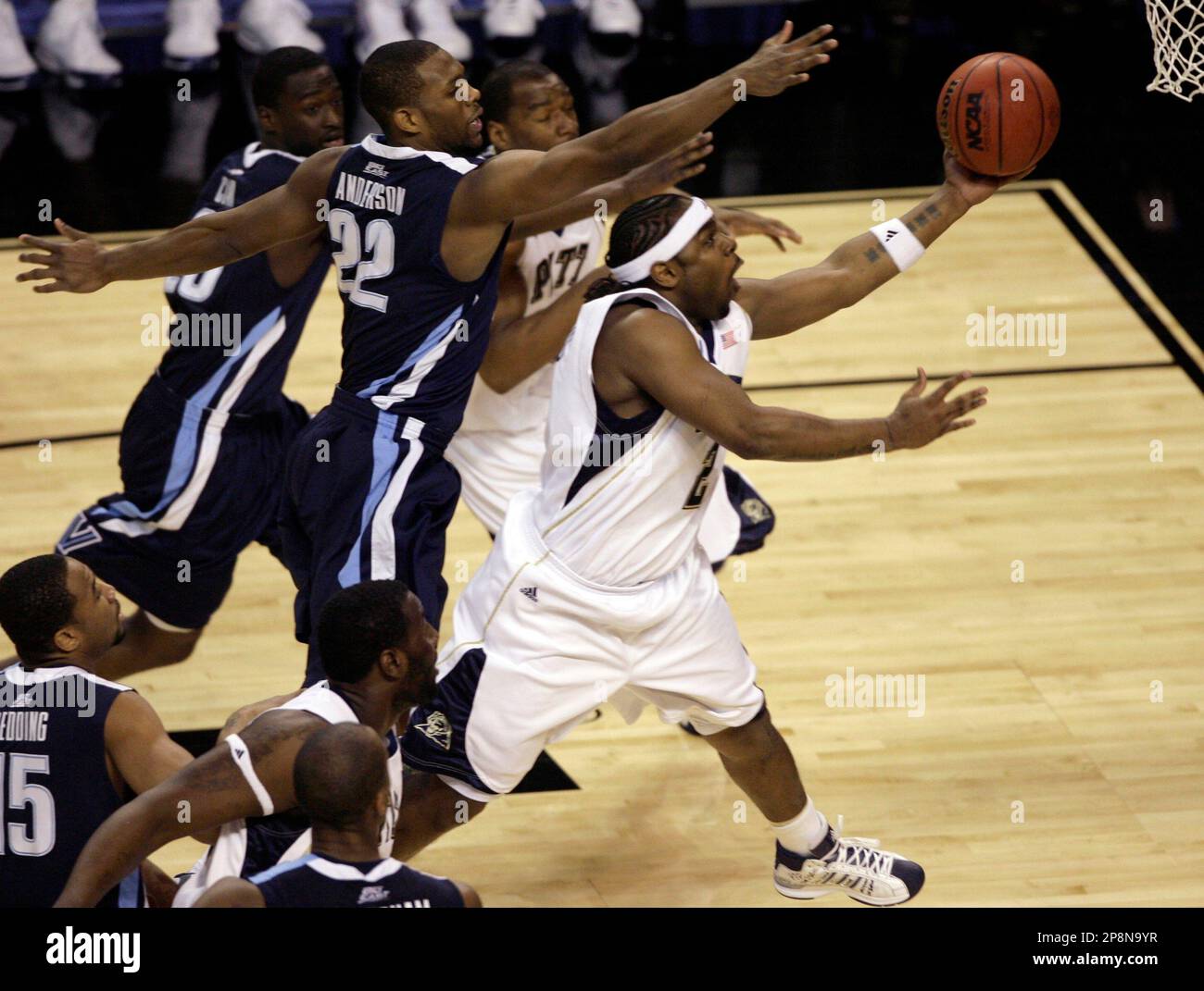 Pittsburgh guard Levance Fields (2) goes to the basket ahead of ...