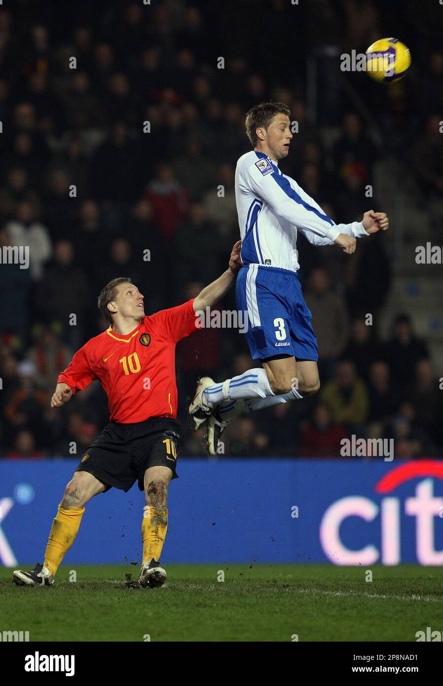 Belgium's Wesley Sonck, left, is challenged by Samir Muratovic of ...