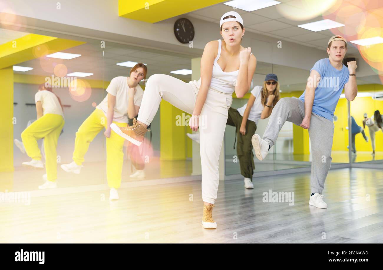 Young girl training breakdance Footwork moves in dance hall Stock Photo ...