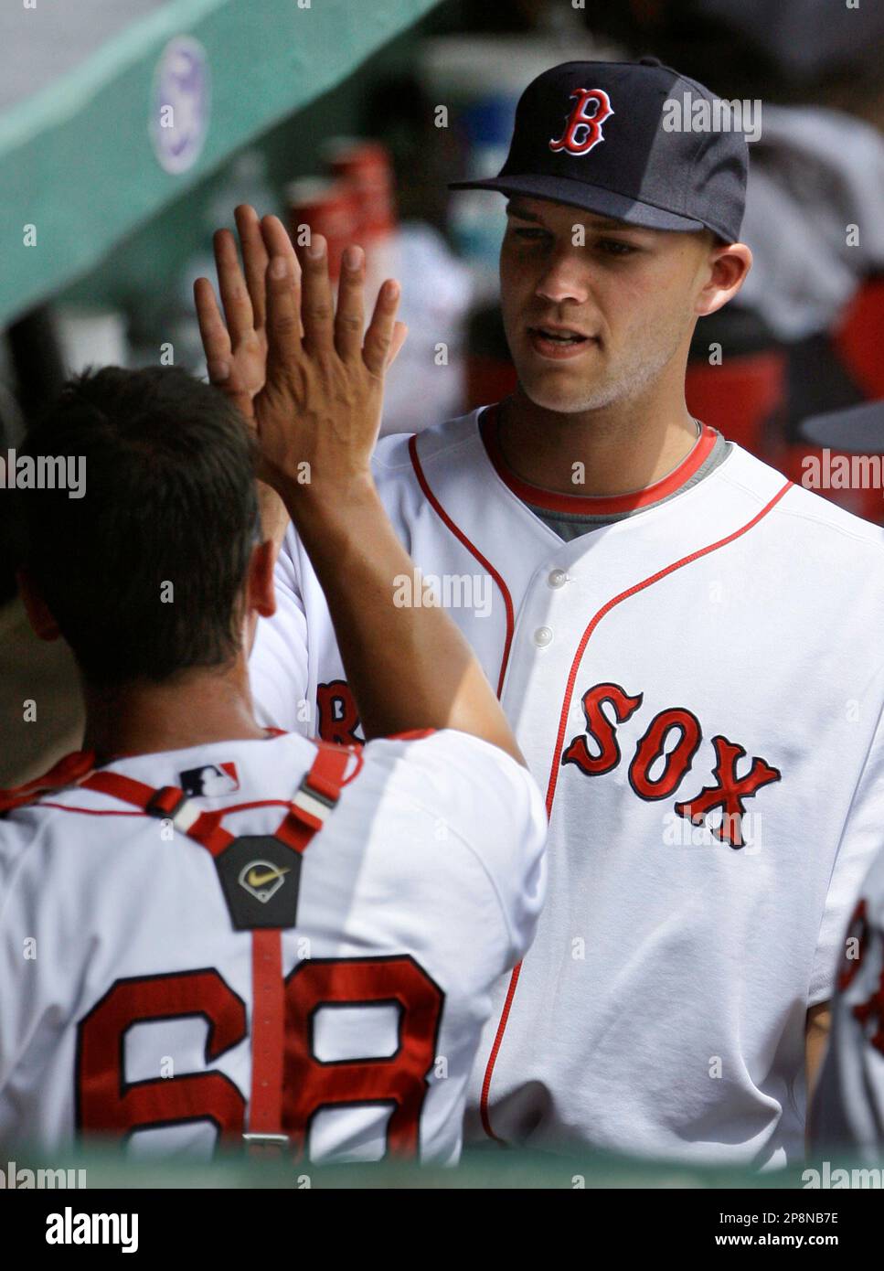 Boston Red Sox pitcher Justin Masterson, right, high-fives catcher ...