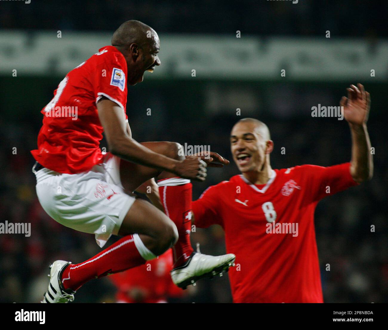 Gelson Fernandes of Switzerland, left, celebrates scoring against ...