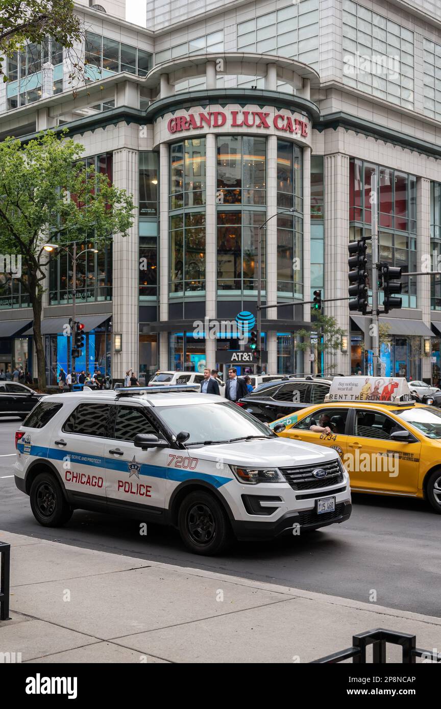 A vertical shot of the Chicago Police Department car on a busy street ...