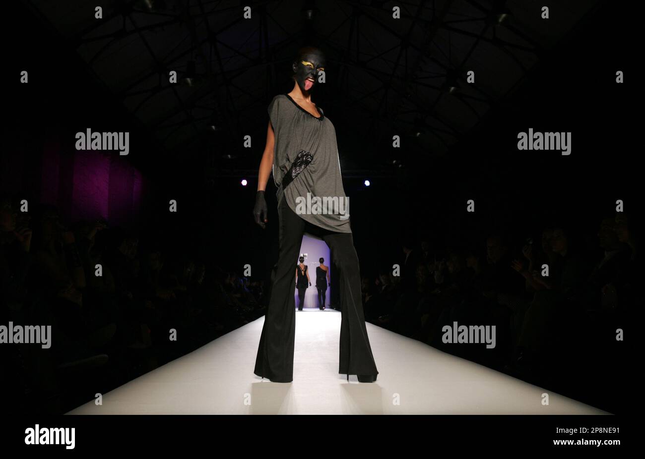 A model presents an outfit by Greek designer Cathy Headels during the ...