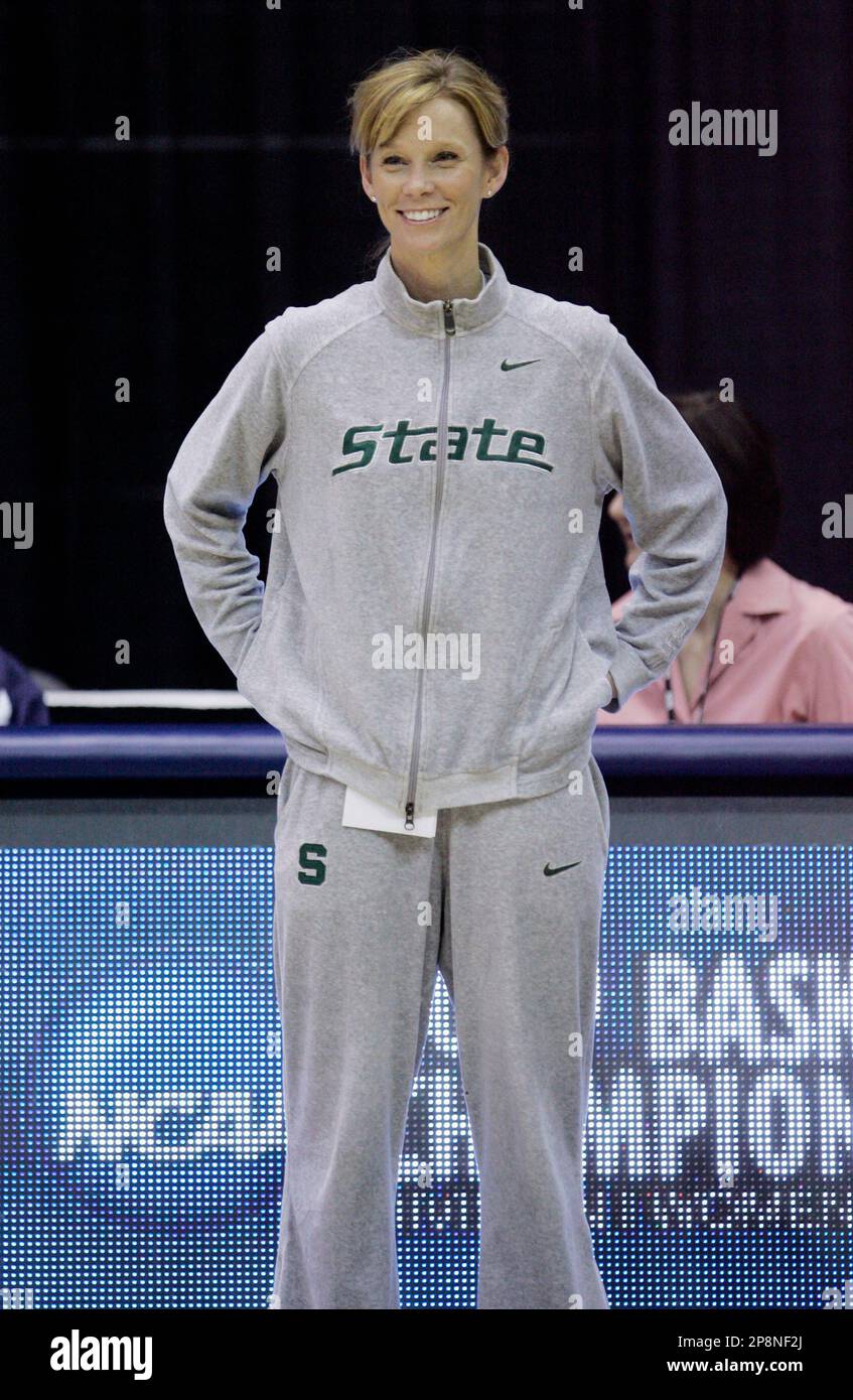 Michigan State head coach Suzy Merchant smiles during practice at the ...