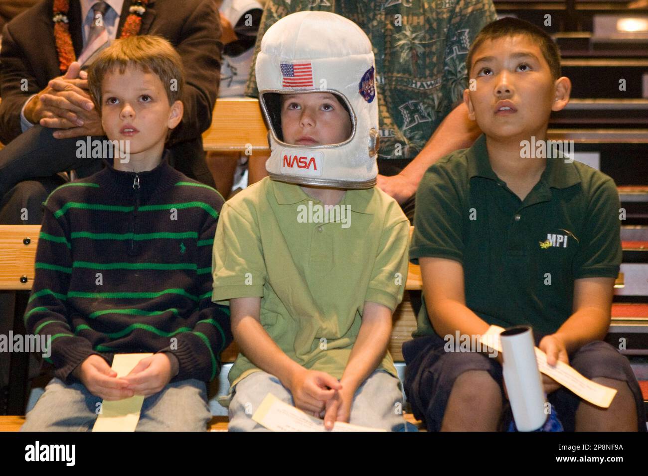 Middle school students Llya Sherstyuk, left, Hunter Owens, and Issac ...