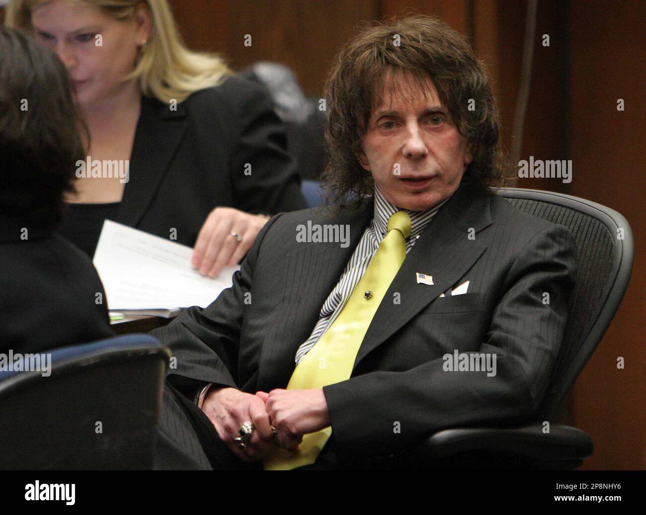 Phil Spector is seated in the courtroom during his retrial murder case ...