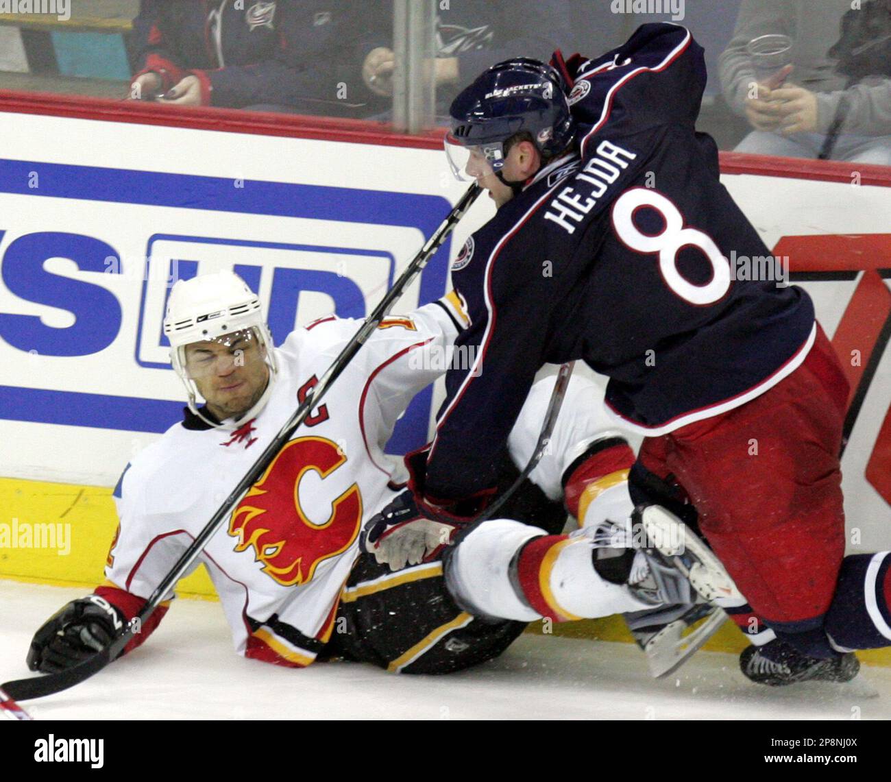 Calgary Flames' Jarome Iginla, left, and Columbus Blue Jackets' Jan ...