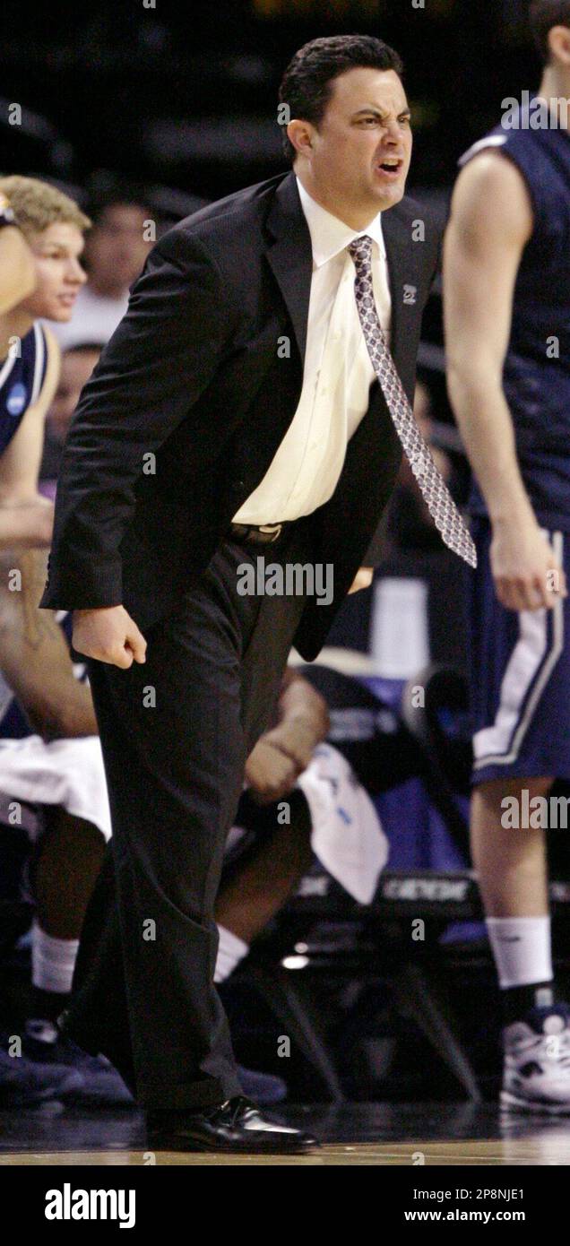 Xavier head coach Sean Miller shouts to his team in the first half ...