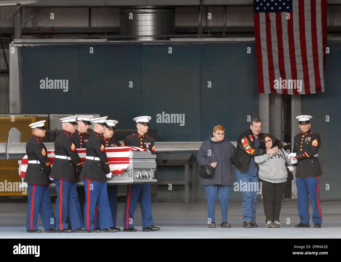 The casket of U.S. Marine Lance Cpl. Daniel Geary is carried from a ...