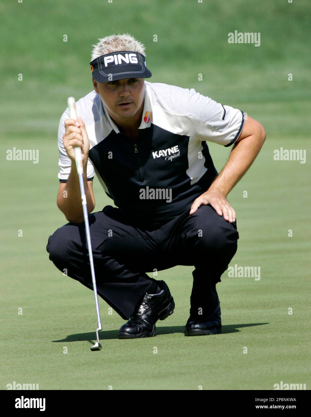 Daniel Chopra, of Sweden, lines up a putt on the eight green during the ...