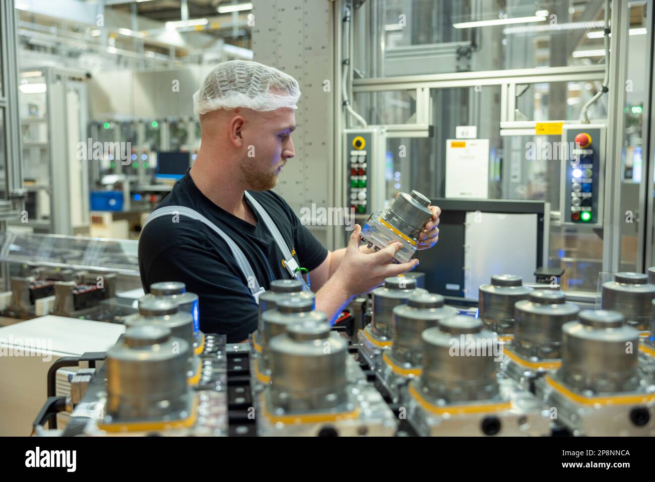 03 March 2023, Hesse, Frankfurt/Main: A Continental employee checks a ...