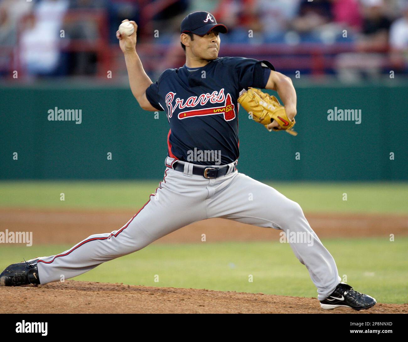 Atlanta Braves pitcher Kenshin Kawakami, of Japan, throws to a ...