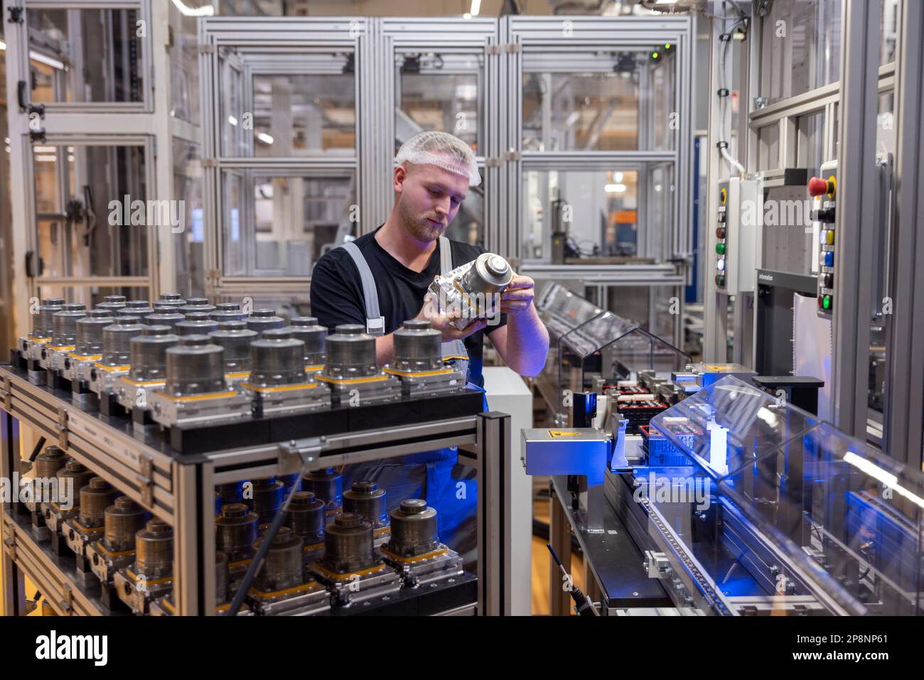 03 March 2023, Hesse, Frankfurt/Main: A Continental employee checks a ...