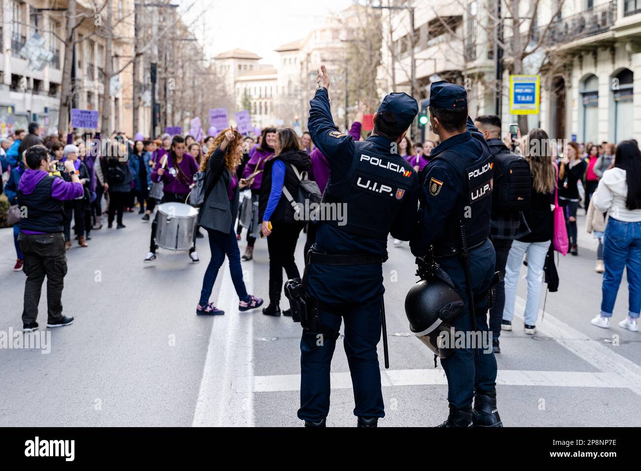 people demonstrating in the streets of Granada, on international women ...