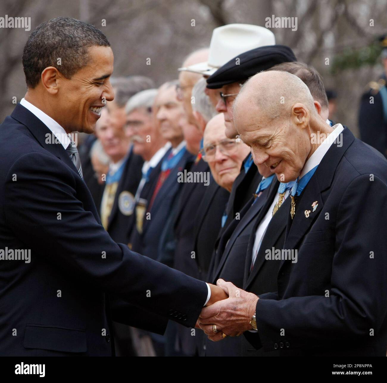President Barack Obama shakes hands with Medal of Honor recipient Bob ...