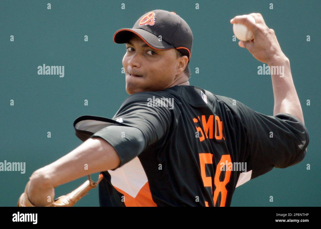 Baltimore Orioles pitcher Alfredo Simon throws to a Washington ...