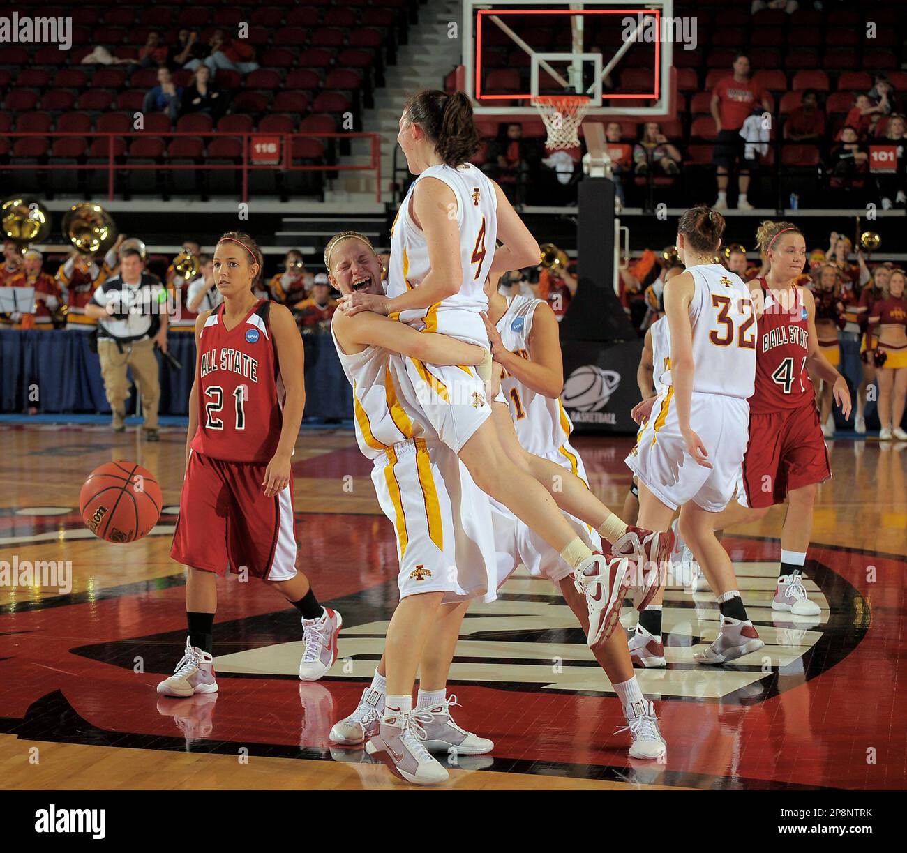 Iowa State's Heather Ezell picks up teammate Alison Lacey (4) after ...