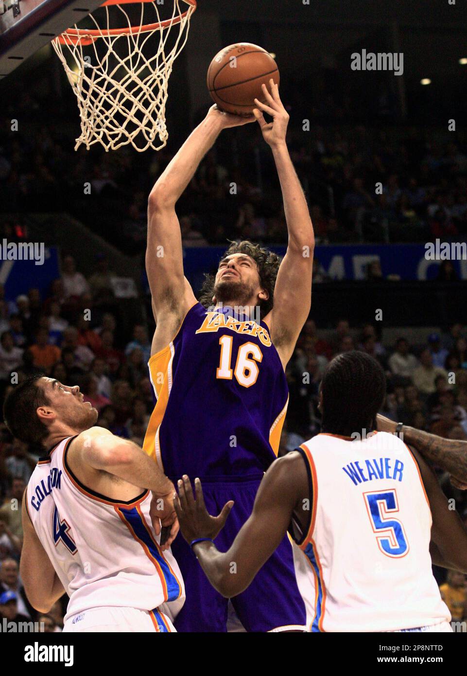 Los Angeles Lakers forward Pau Gasol, center, of Spain, shoots over ...