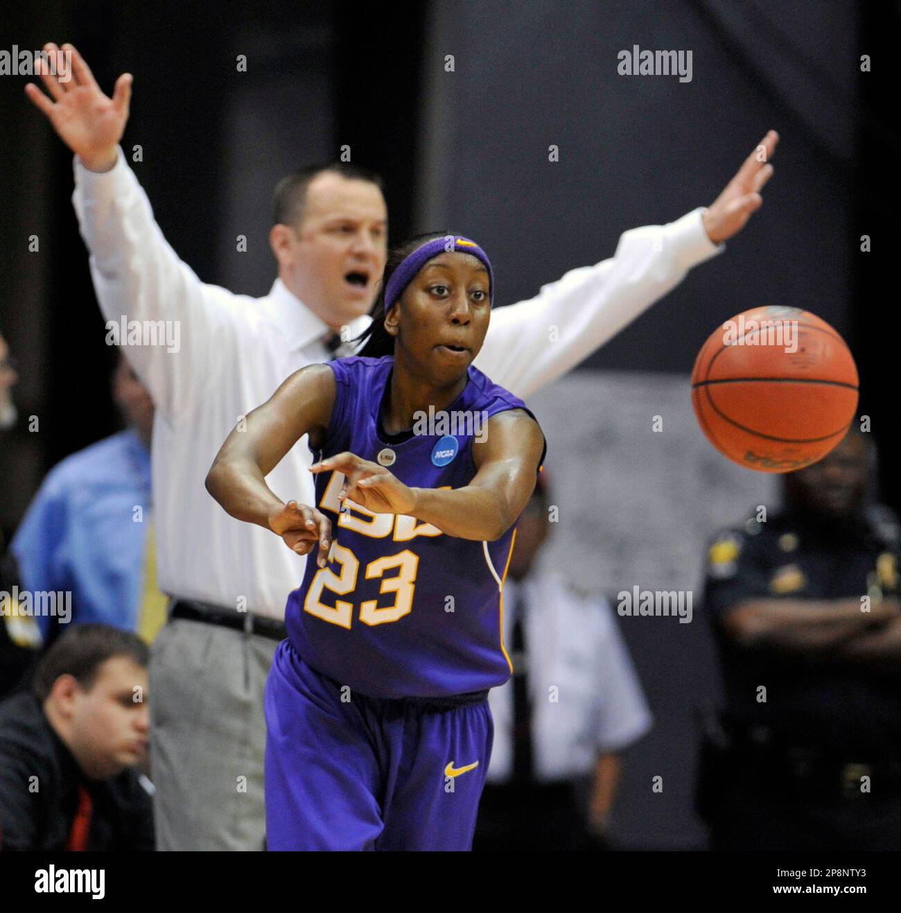 LSU guard Allison Hightower passes the ball in front of Louisville ...