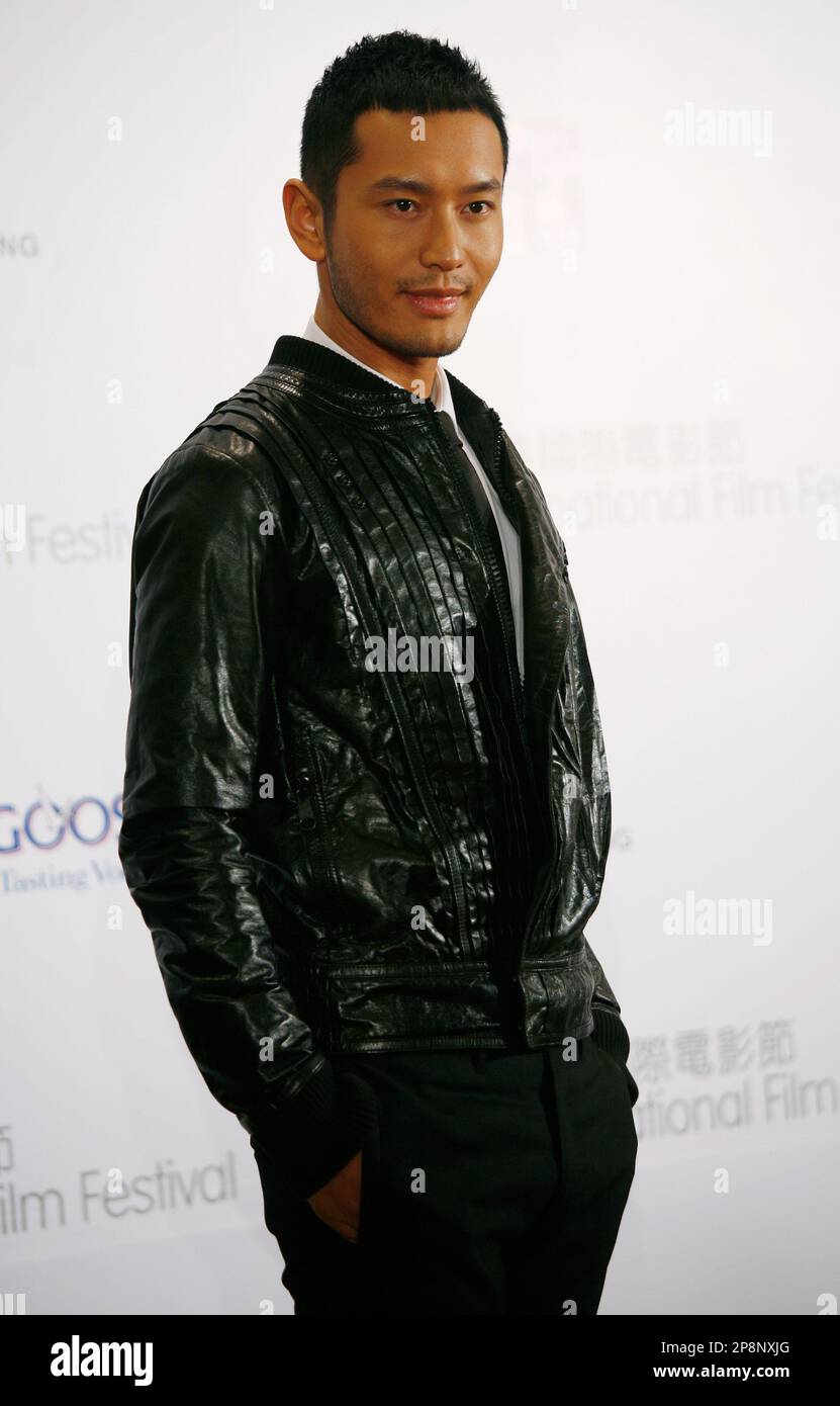 Mainland Chinese actor Huang Xiaoming poses for photographers at the ...