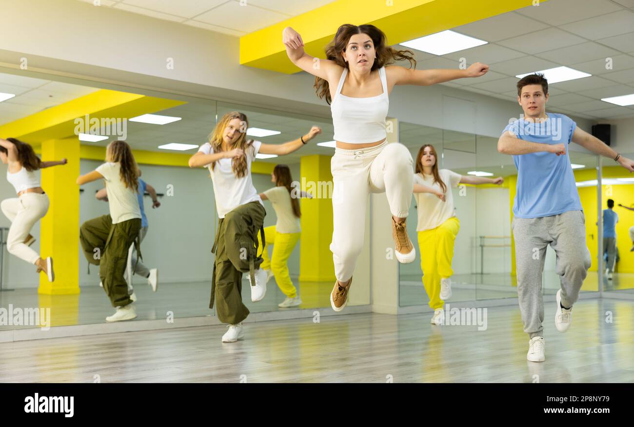 Young girl dancing modern dance in studio Stock Photo - Alamy