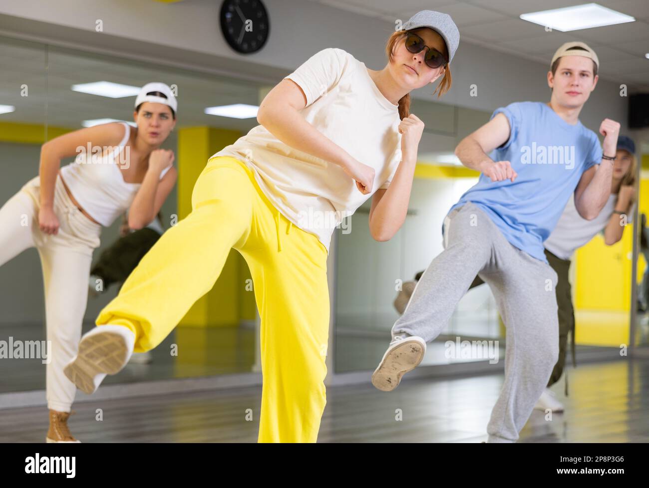 Young girl training breakdance Footwork moves in dance hall Stock Photo ...