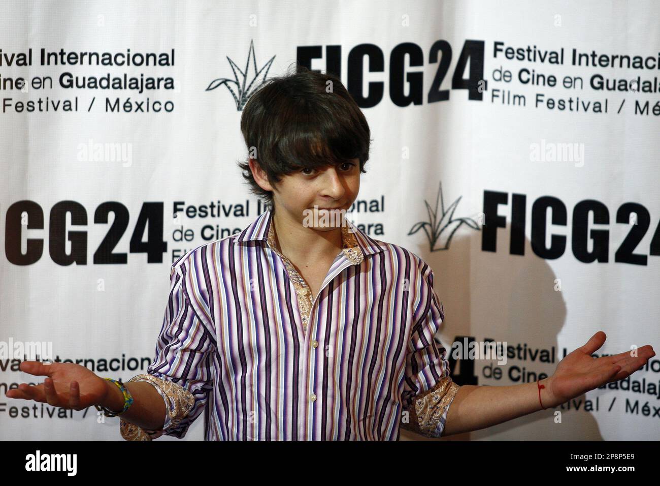 U.S.-born actor Moises Arias poses for pictures as he attends the ...