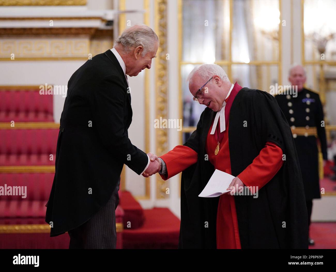 King Charles III and the Dean of Westminster David Hoyle, during a ...