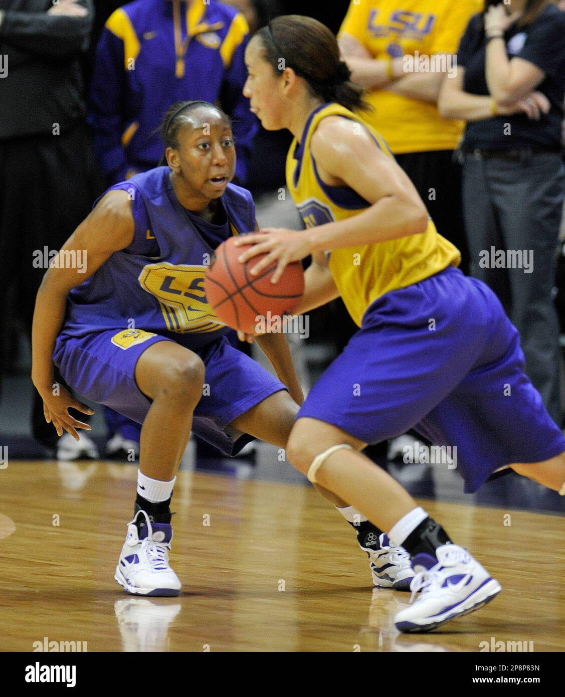 LSU guard Allison Hightower, left, guards Andrea Kelly, right, during a ...