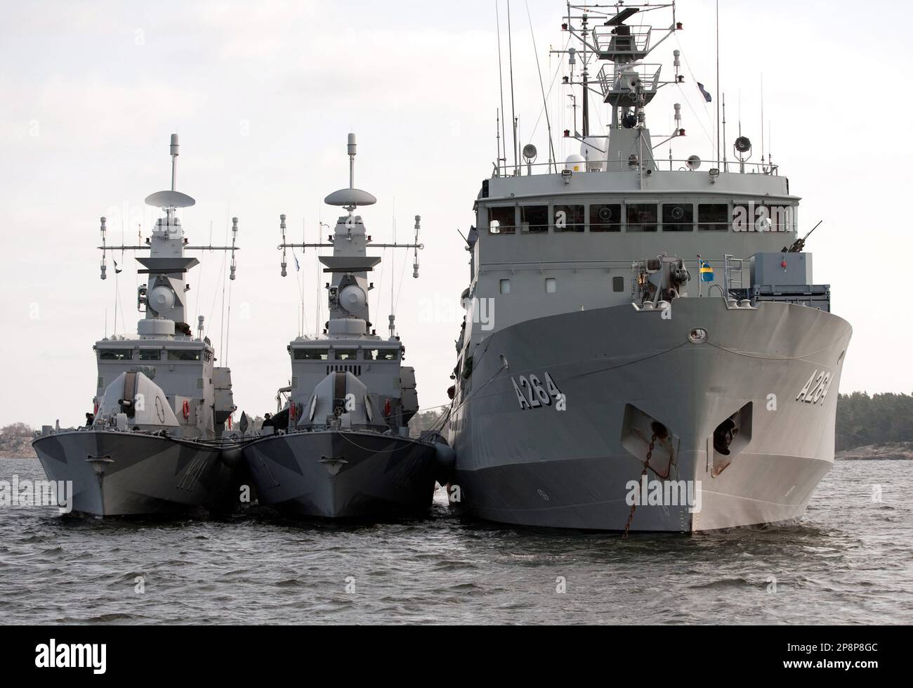 Sweden's HMS Stockholm, left, HMS Malmo and HMS Trosso, right, are seen ...