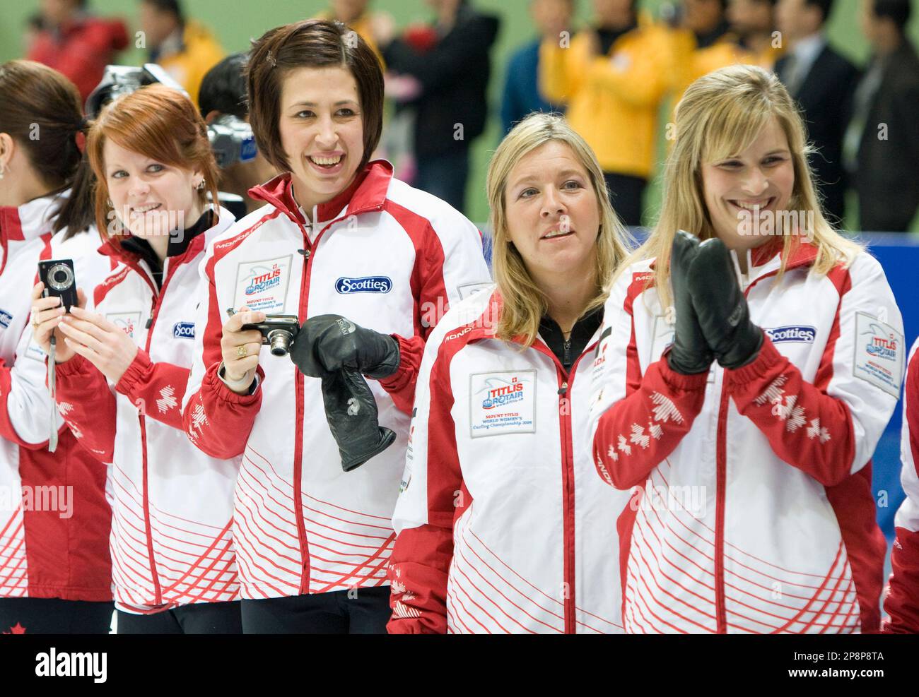 Team Canada members, right to left, Jennifer Jones, Cathy Overton ...
