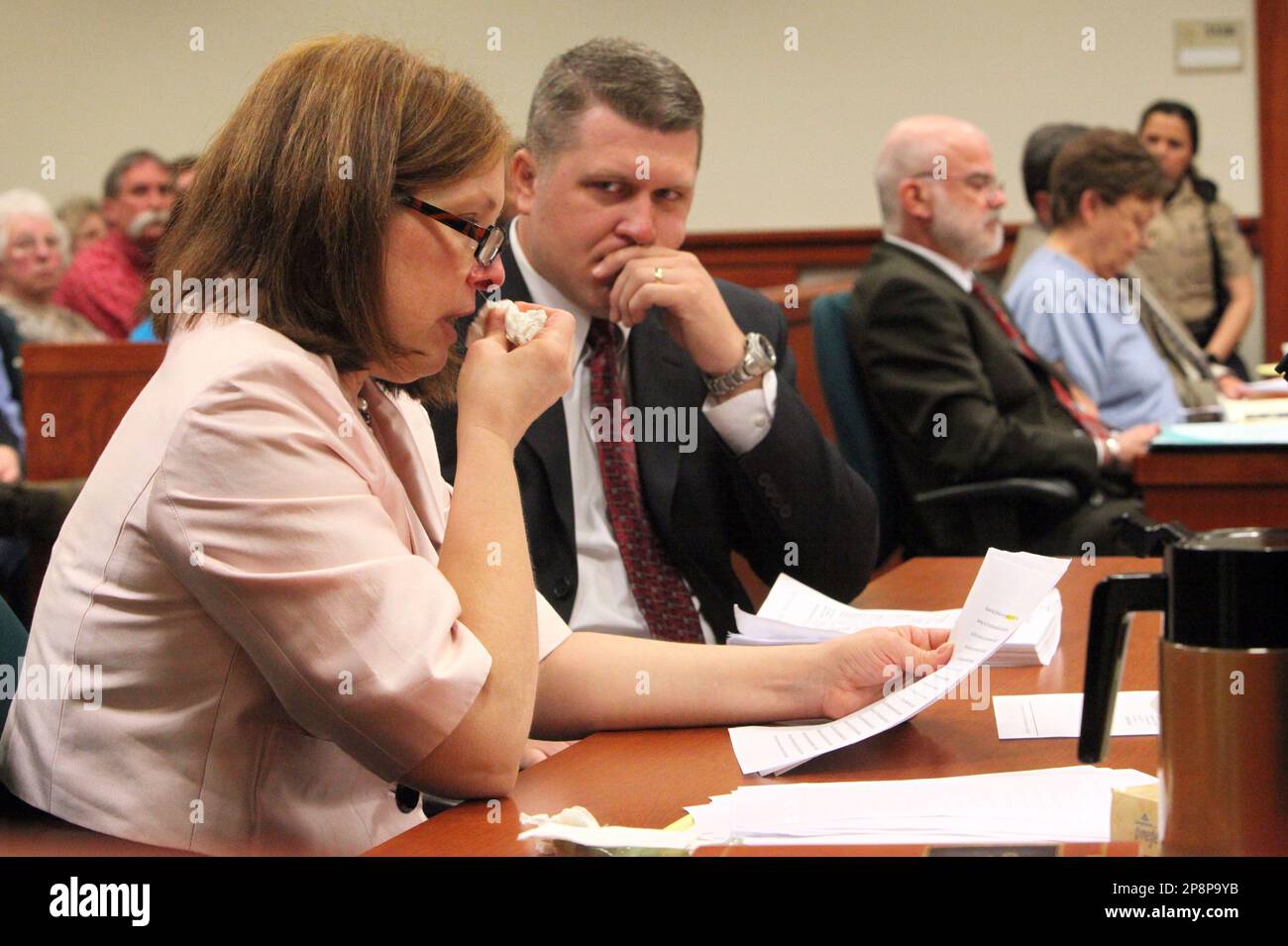 Sandra Burke, oldest daughter of murder victim Lloyd Ford, reads a ...
