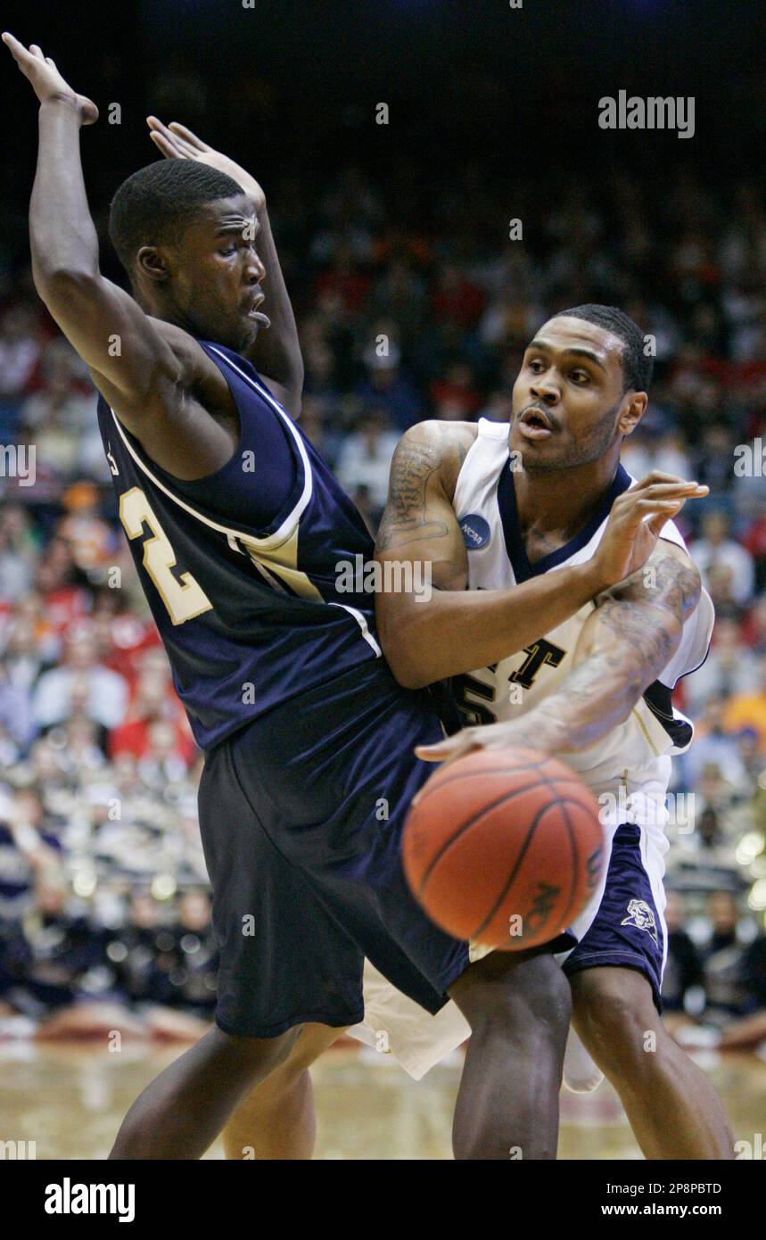 Pittsburgh's Tyrell Biggs, right, passes around East Tennessee State's ...