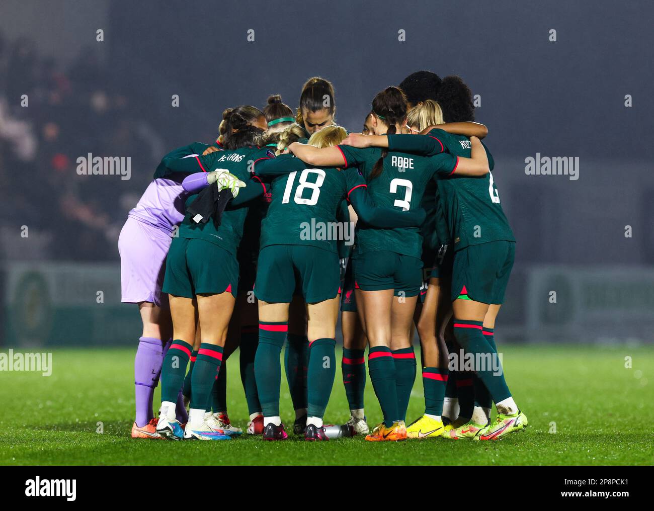Liverpool players have a team huddle before kick off of the Barclays ...