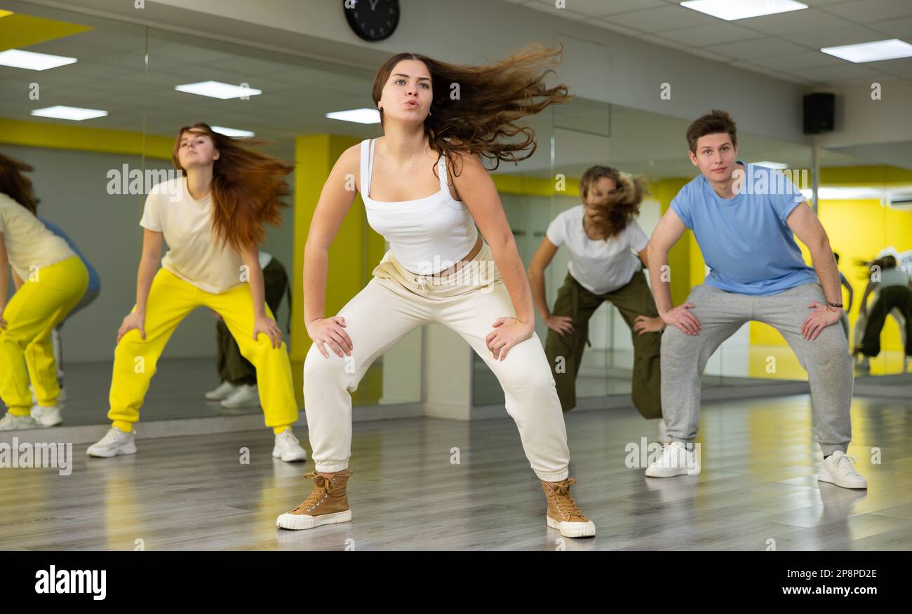 Young girl training breakdance Toprock moves in dance hall Stock Photo - Alamy