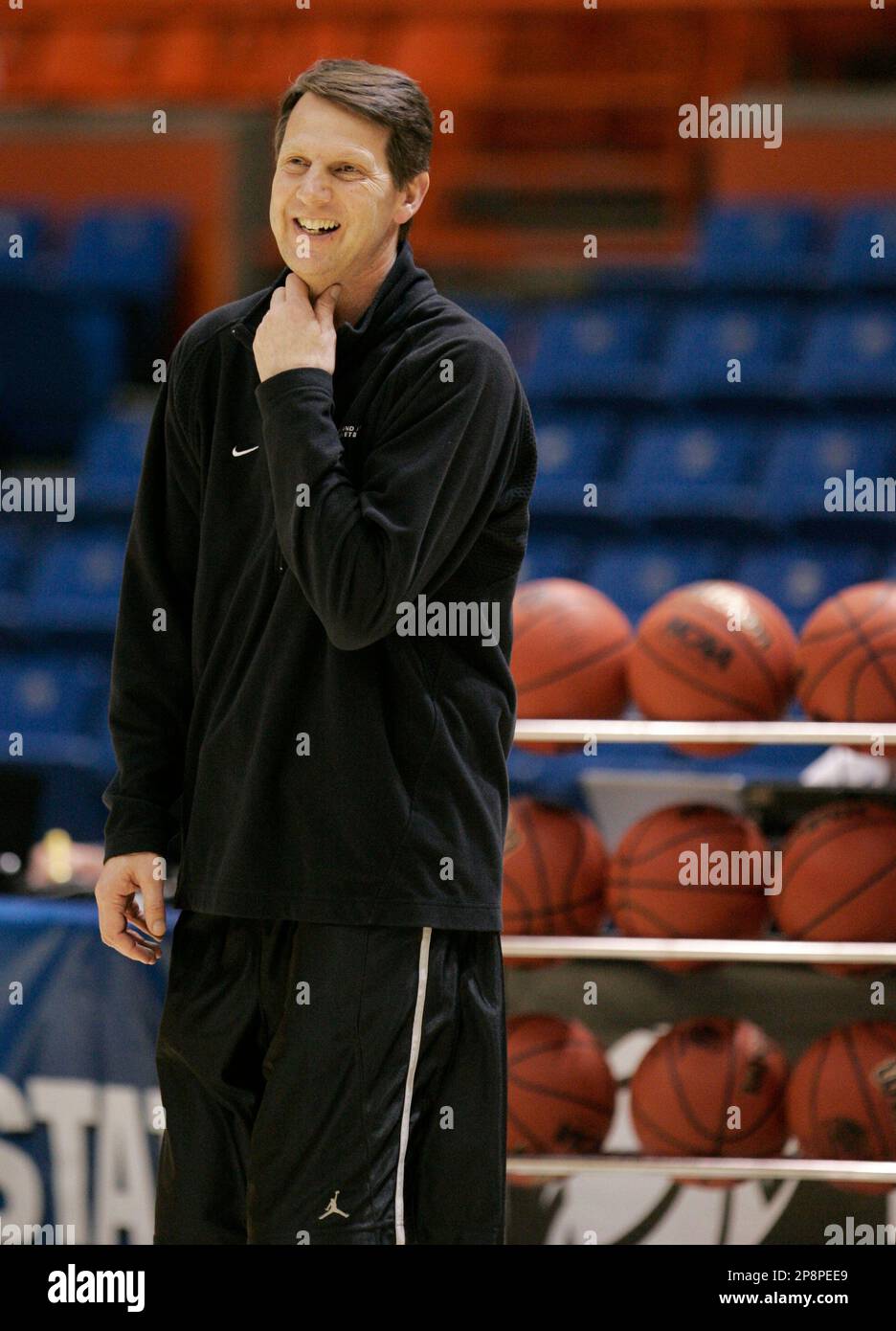 Portland State head coach Ken Bone smiles during practice for a first ...