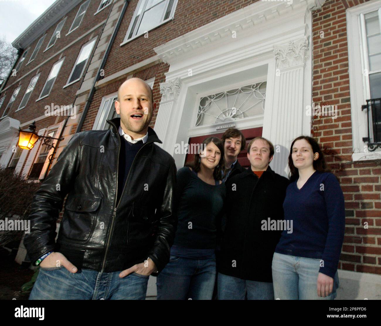 Greg Epstein, left, the humanist chaplain at Harvard University, poses with students after a ...
