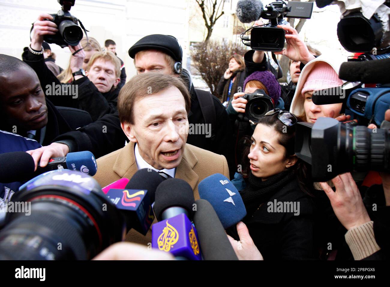 Defense attorney Rudolf Mayer speaks in front of the entrance of the ...