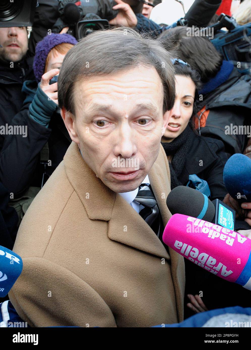 Defense attorney Rudolf Mayer speaks in front of the entrance of the ...