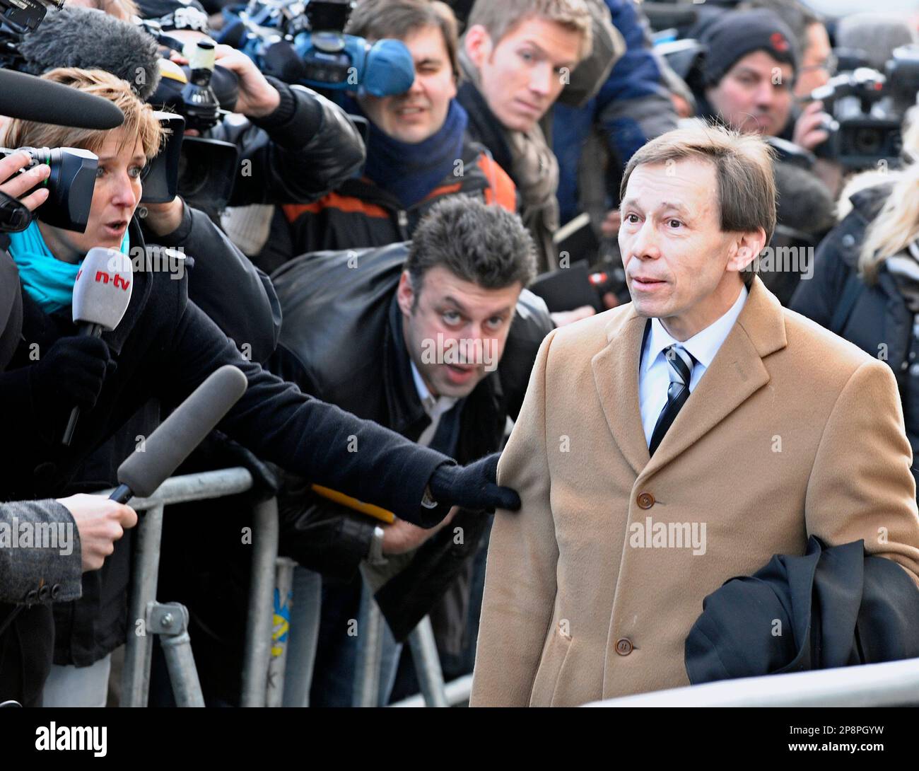 Defense attorney Rudolf Mayer speaks in front of the entrance of the ...