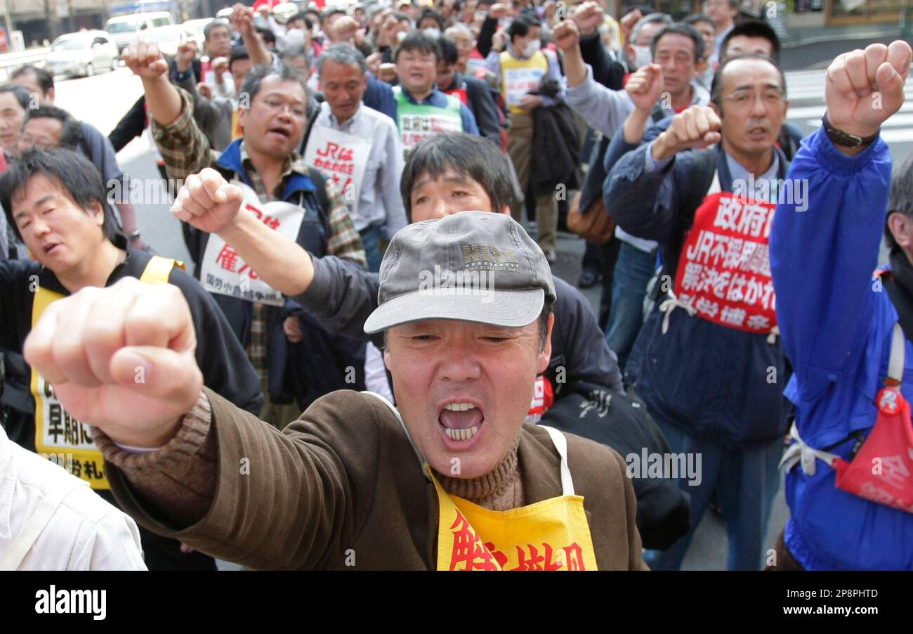 Labor union members of East Japan Railway Co. shout slogans as they ...