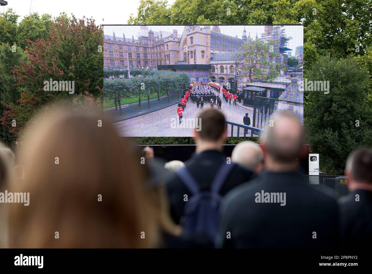 People watch the TV coverage of the late Queen Elizabeth II’s funeral ...