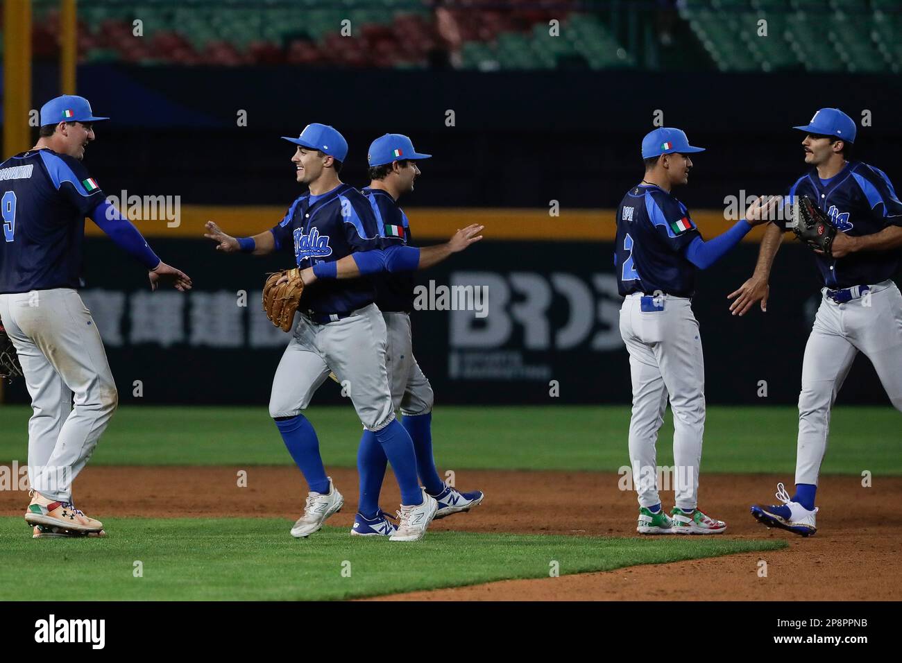 Italy's players celebrate after defeating Cuba at a Pool A game for the ...