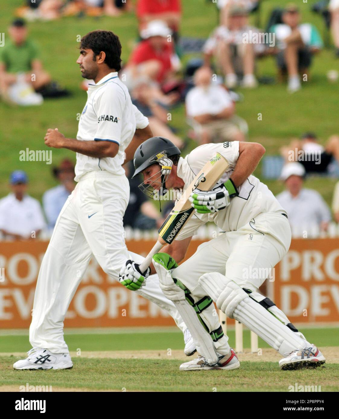 New Zealand's Tim McIntosh hesitates for the run in front of Indian ...