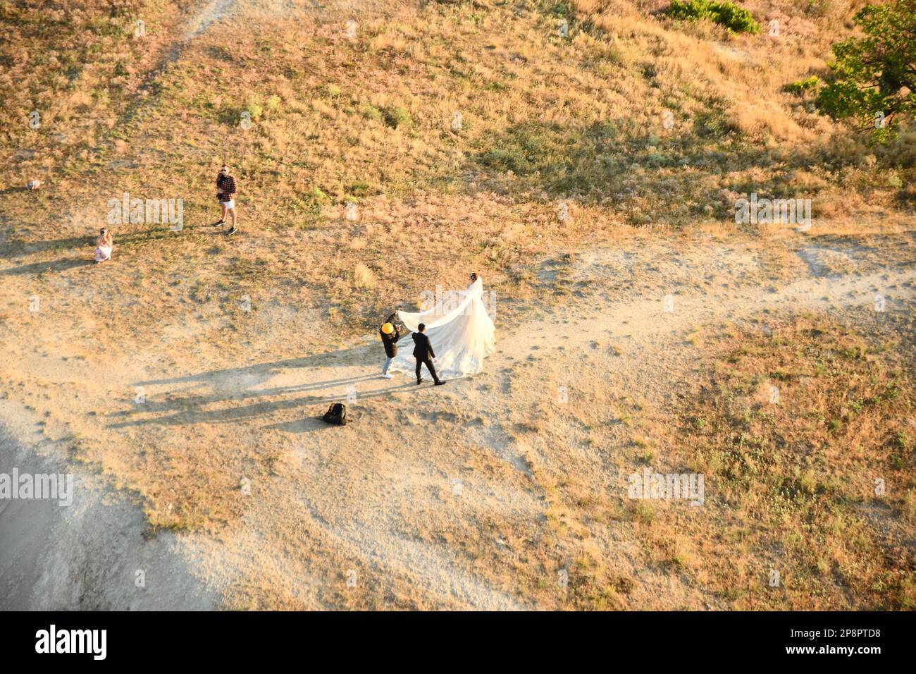 An aerial view of bride and groom during a photoshoot in Cappadocia ...